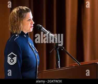 Col. Sirena Morris, 88th Mission Support Group commander, passes a ...