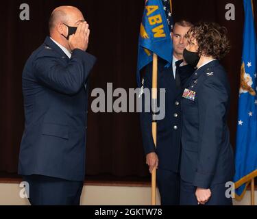 Col. Sirena Morris, 88th Mission Support Group commander, passes a ...