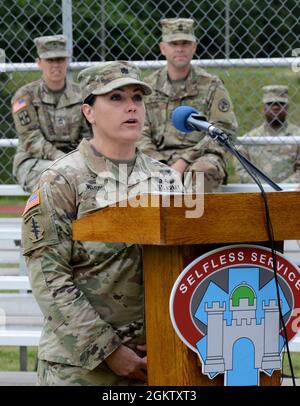 U.S. Army Lt. Col. Christina Buchner receives the unit colors from U.S ...