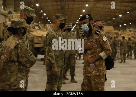 Col. David Key and Command Sgt. Maj. Denice Malave uncase the 3rd ...