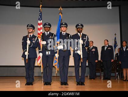 The Kirtland Air Force Base Honor Guard presents the colors during a ...