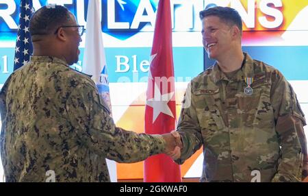 Fleet Master Chief Donald Myrick (far right), moderates a panel of ...