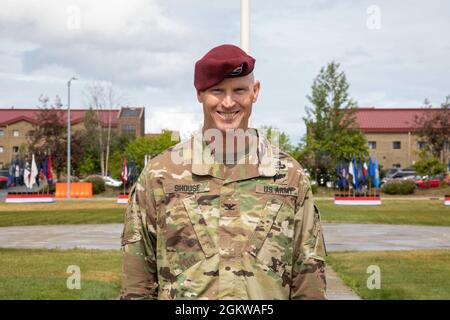 U.S. Army Col. Michael “Jody” Shouse, stand with the color guard of the ...