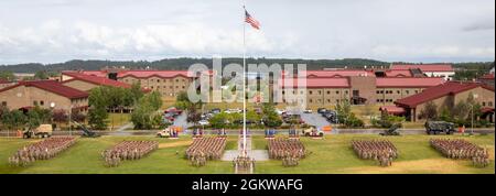 U.S. Army Col. Michael “Jody” Shouse, stand with the color guard of the ...