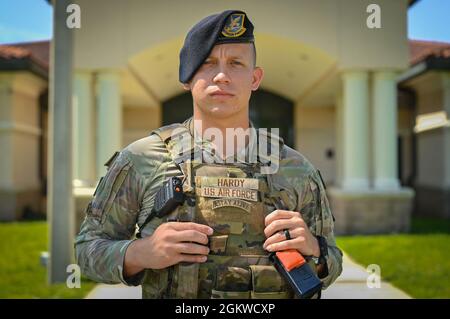 A1C Jonathan Hardy, 45th Security Forces Squadron patrolman, poses for ...