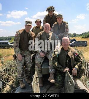 Lt Gen Roger Cloutier, NATO Allied Land Command, presents Commander Lt ...