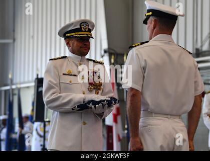 Captain Matt Arny, outgoing commanding officer of Naval Air Station ...
