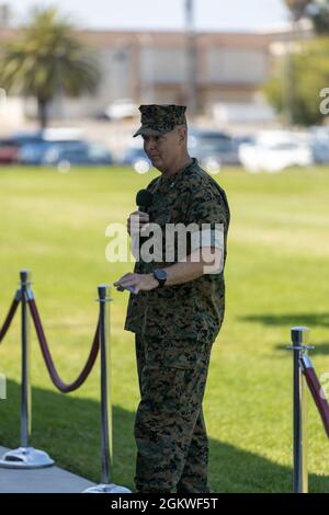 U.S. Marine Col. Kevin R. Korpinen (left), the outgoing commanding ...