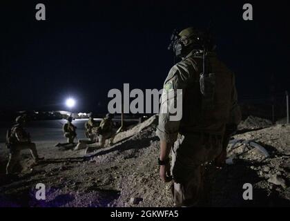 Norwegian Soldiers from Task Force Vikings conduct a transfer of ...