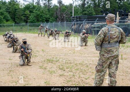 Staff Sgt. Eric Rapp, an observer-coach/trainer with the 1st Training ...