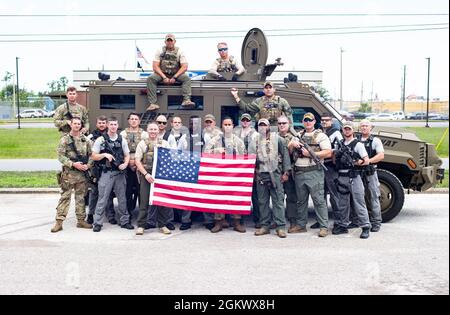 Special forces tactical team of three in action, unmarked and ...