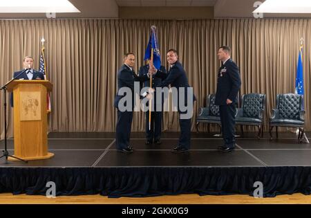 Col. James Gherdovich, 319th Mission Support Group commander, receives ...