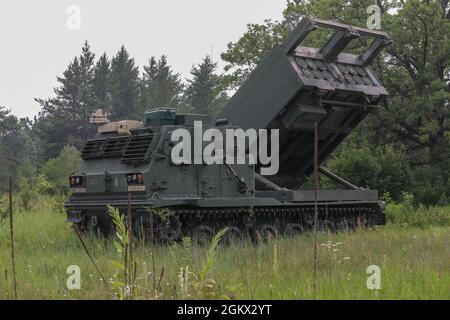 An M270A1 MLRS from the 1-147th FA, South Dakota National Guard, conducts a practice field ...