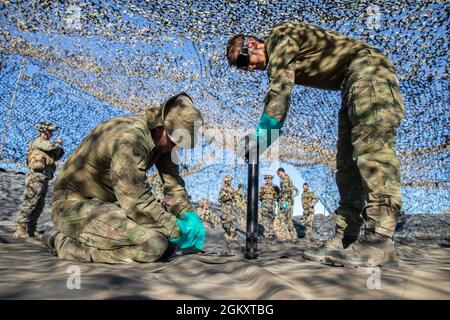 From left to right: Australian Army Brig. Ash Collingburn, commanding ...