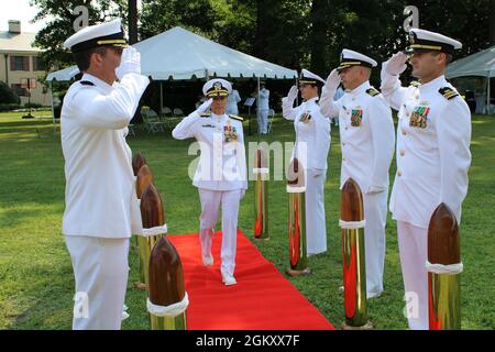 Rear Adm. Lore Aguayo relieved Rear Adm. Dean A. VanderLey as commander ...