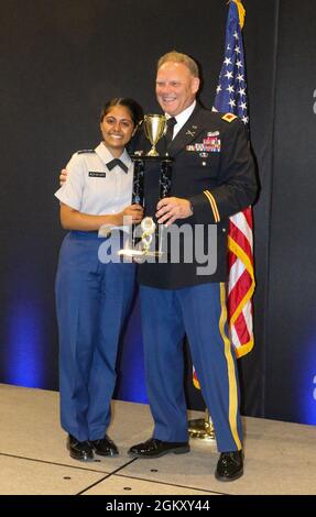 Col. Steve Smith, Army JROTC director, presents the Col. Carlos R ...