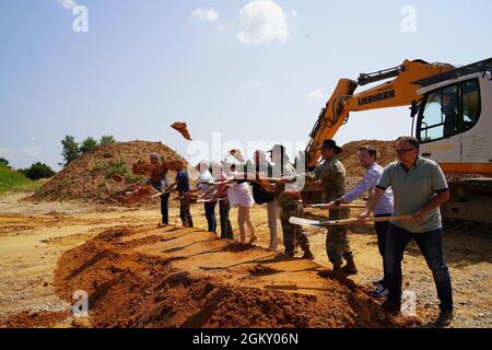 Command Sgt. Maj. Christopher Carbone passes the squadron colors to Lt ...