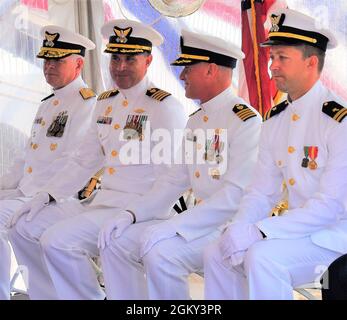 Vice Adm. Steven Poulin, commander, U.S. Coast Guard Atlantic Area, and Command Master Chief ...