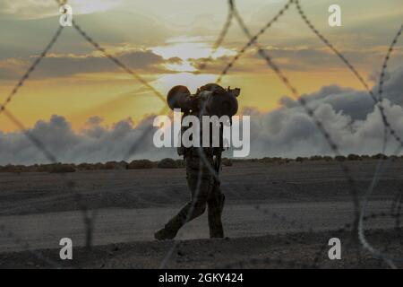 Soldiers carrying a Javelin missile system during a Deployment Mission ...