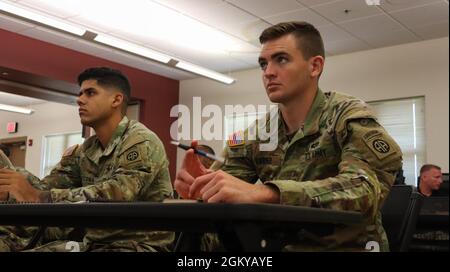 U.S. Army Pfc. Cade Garner, a Geospatial Intelligence Imagery Analyst ...