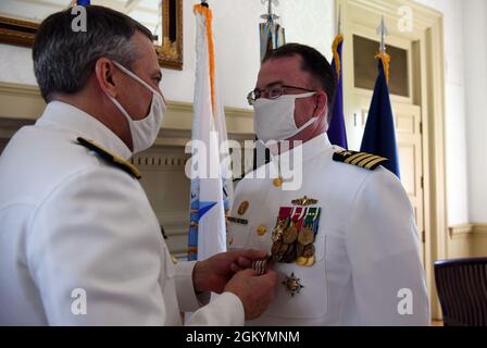 U.S. Army Col. William Kirby, right, passes the colors during the Joint ...
