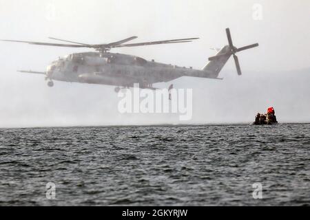 U.S. Army Operational Detachment-Alpha (ODA) members move towards their ...