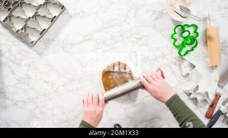 Flat lay. Step by step. Rolling out gingerbread cookie dough to bake ...