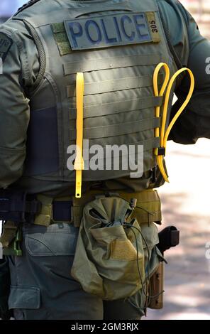 A law enforcement officer stands outside Utah Valley University on ...