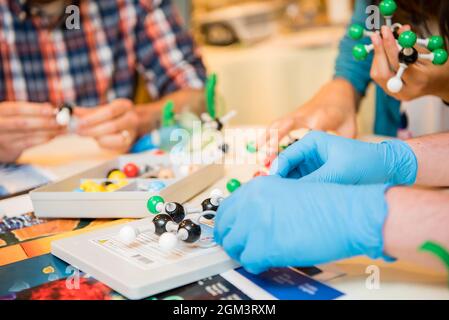 Kids wearing latex gloves for science experiment Stock Photo - Alamy