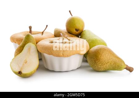 Tasty pear pot pies and fresh fruits on light background Stock Photo ...