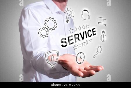 Quality concept levitating above a human hand Stock Photo - Alamy