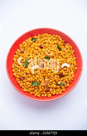 Close up of crunchy masala boondi Indian namkeen (snacks) on a ceramic ...