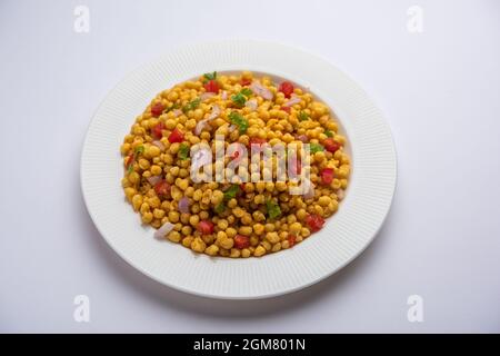 Boondi Chaat or Bundi Bhel, popular roadside snack item from India ...