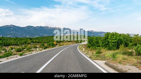 Scenic road. Road is surrounded by a magnificent natural landscape ...