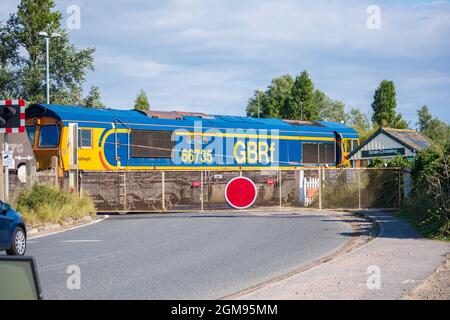 A Class 66 heavy freight diesel railway locomotive pulling a train ...