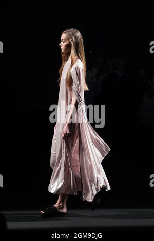A model walks the runway at the Roberto Torretta fashion show during ...