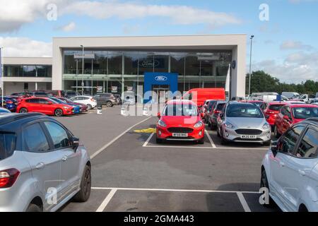 Vospers Ford forecourt and car dealer showroom, Exeter Stock Photo - Alamy