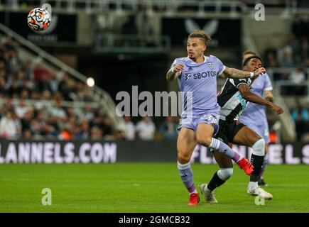 Joe Willock Of Newcastle United battles with Tyrone Mings Of Aston ...