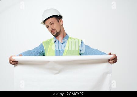 male builders blueprints builder isolated background Stock Photo - Alamy