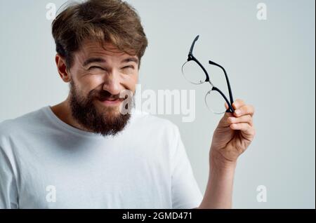 bearded man with poor eyesight health problems close-up Stock Photo - Alamy