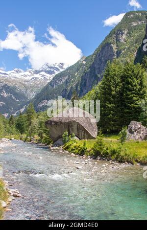 View of the Mello Valley, Val di Mello, a green valley surrounded by ...