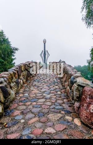 Merkine, Lithuania - 31 August, 2021: stone path leading to a New Age ...