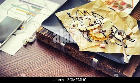 Viennese waffles with filling. Coffee table. A set of fragrant cookies ...