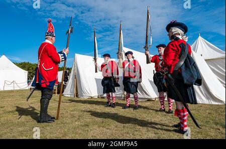 Hanoverian soldiers and officer in period costume for re-enactment of ...