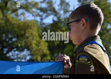 A member of Ukrainian scouting organization Plast attends the meeting ...