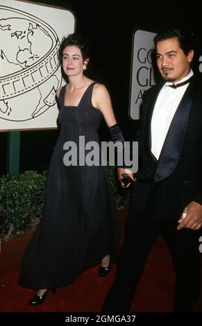 Sean Young and Robert Lujan during 49th Annual Golden Globe Awards at ...
