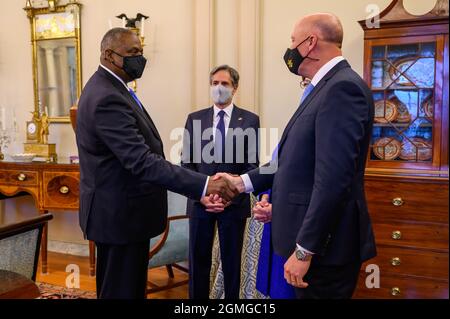 From left to right: Australian Army Brig. Ash Collingburn, commanding ...