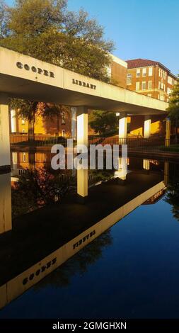 Cooper library reflected in pond on the campus of Clemson University ...