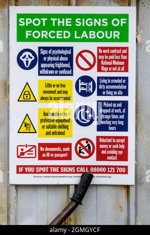Modern Slavery Act, Forced labour PPE type signs on building site ...