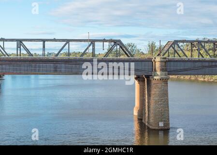 The heritage listed Victoria Bridge that crosses the Nepean River at ...